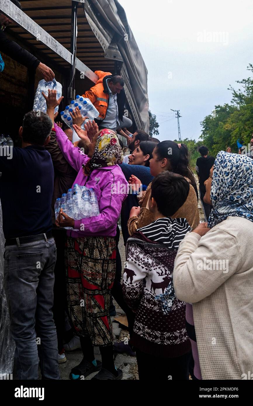 Hatay, Turkey. 08th Apr, 2023. People are seen struggling to get water ...