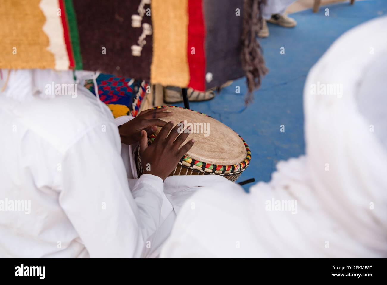 Close up of a man's hands drumming at Dar Gnaoua Bambara Khamlia ...