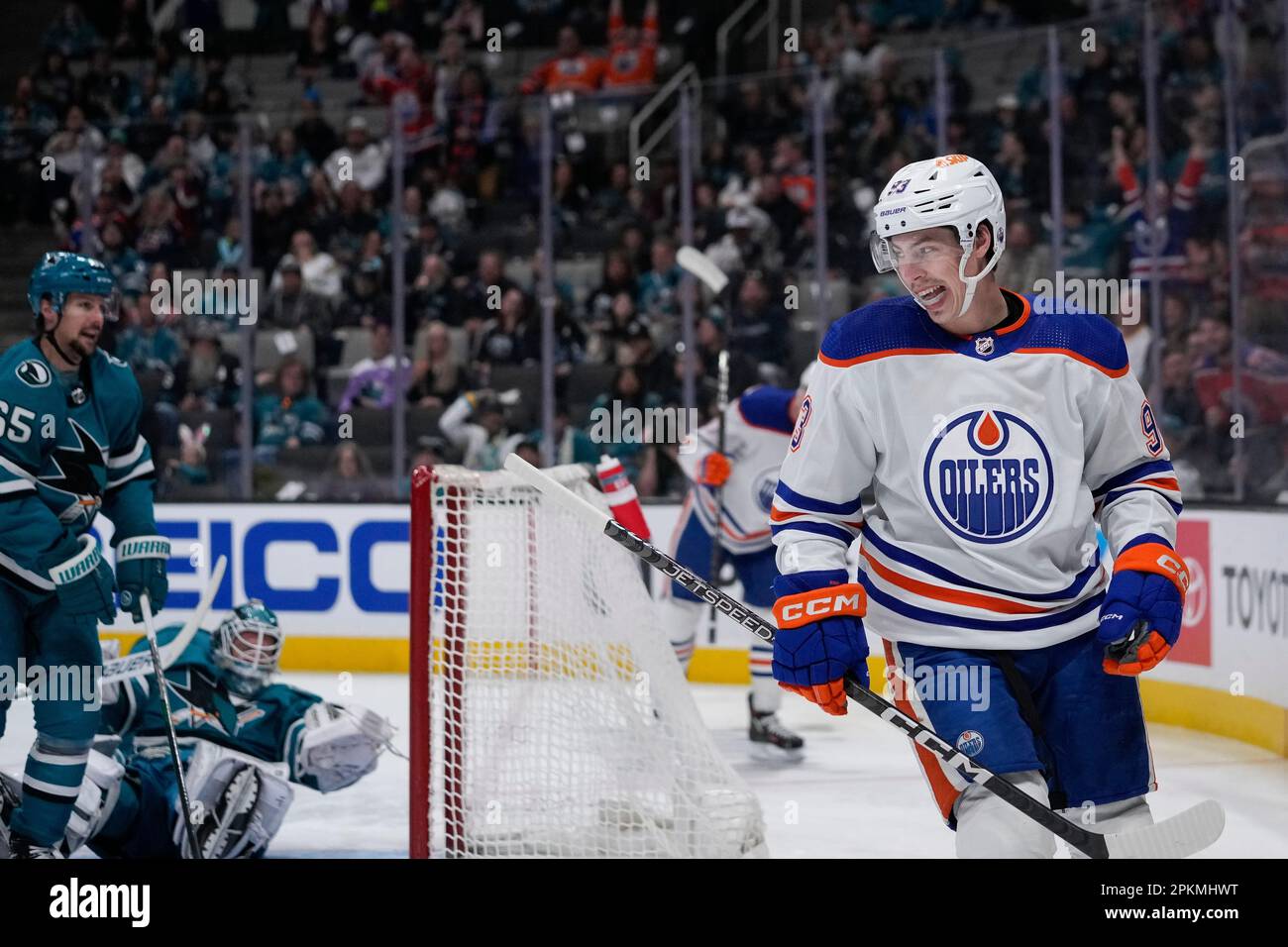 Edmonton Oilers center Ryan Nugent-Hopkins, right, reacts after scoring ...