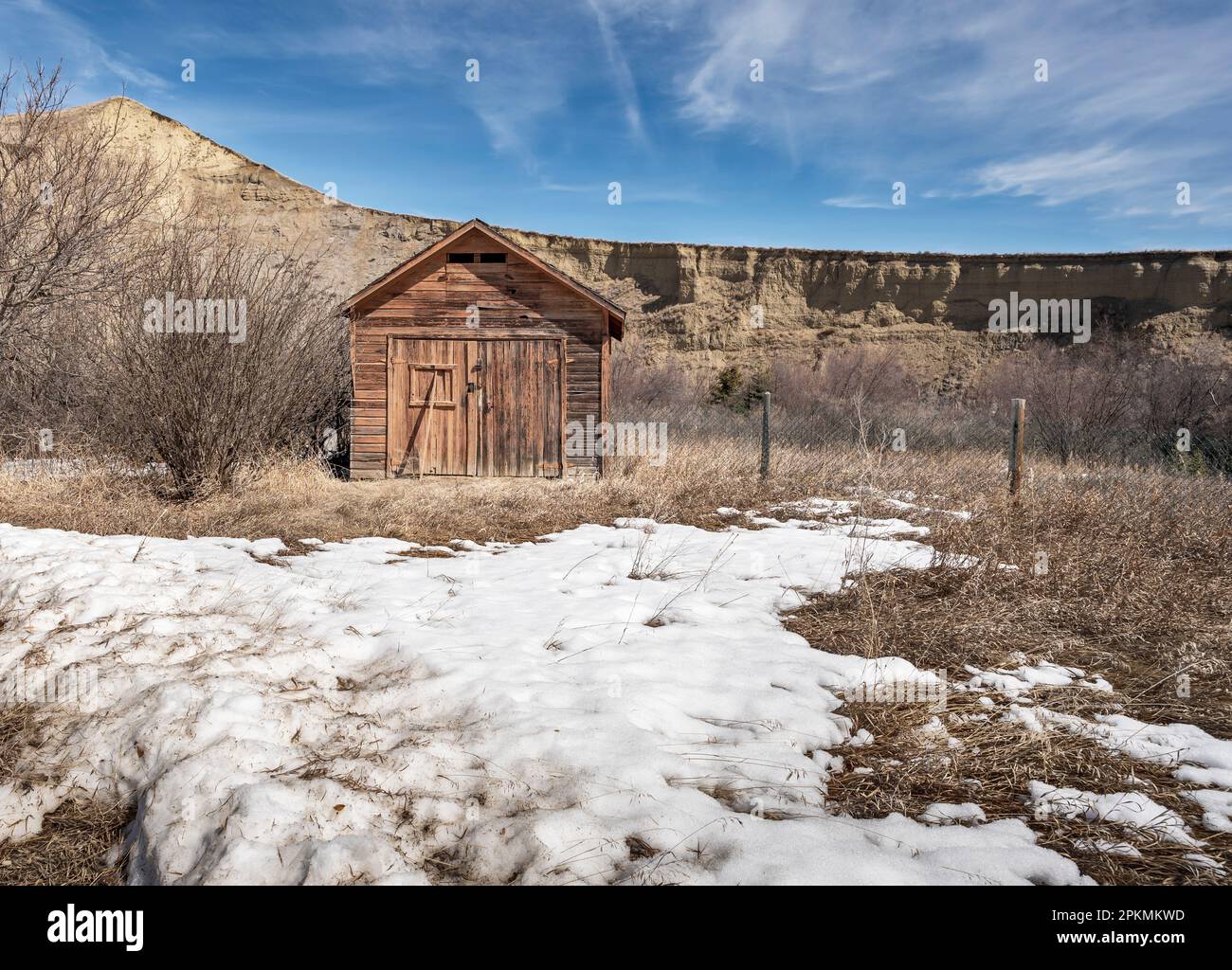Old wooden garage on the bank of the Rosebud River at the ghost town of ...