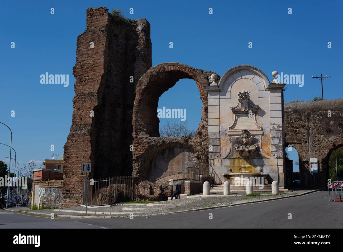 Arch of Sisto V in the Felice aqueduct with the Fountain of Clement XII ...
