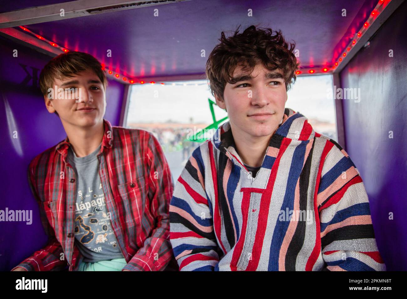 American teen boy tourists looking out during their tuk tuk tour Stock ...