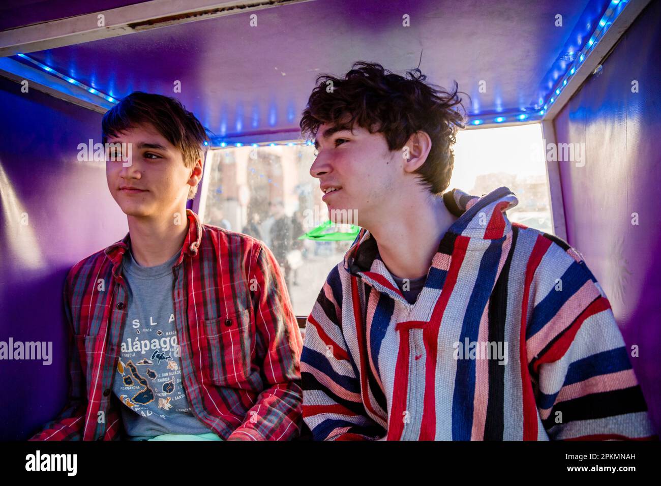 American teen boy tourists looking out during their tuk tuk tour Stock ...
