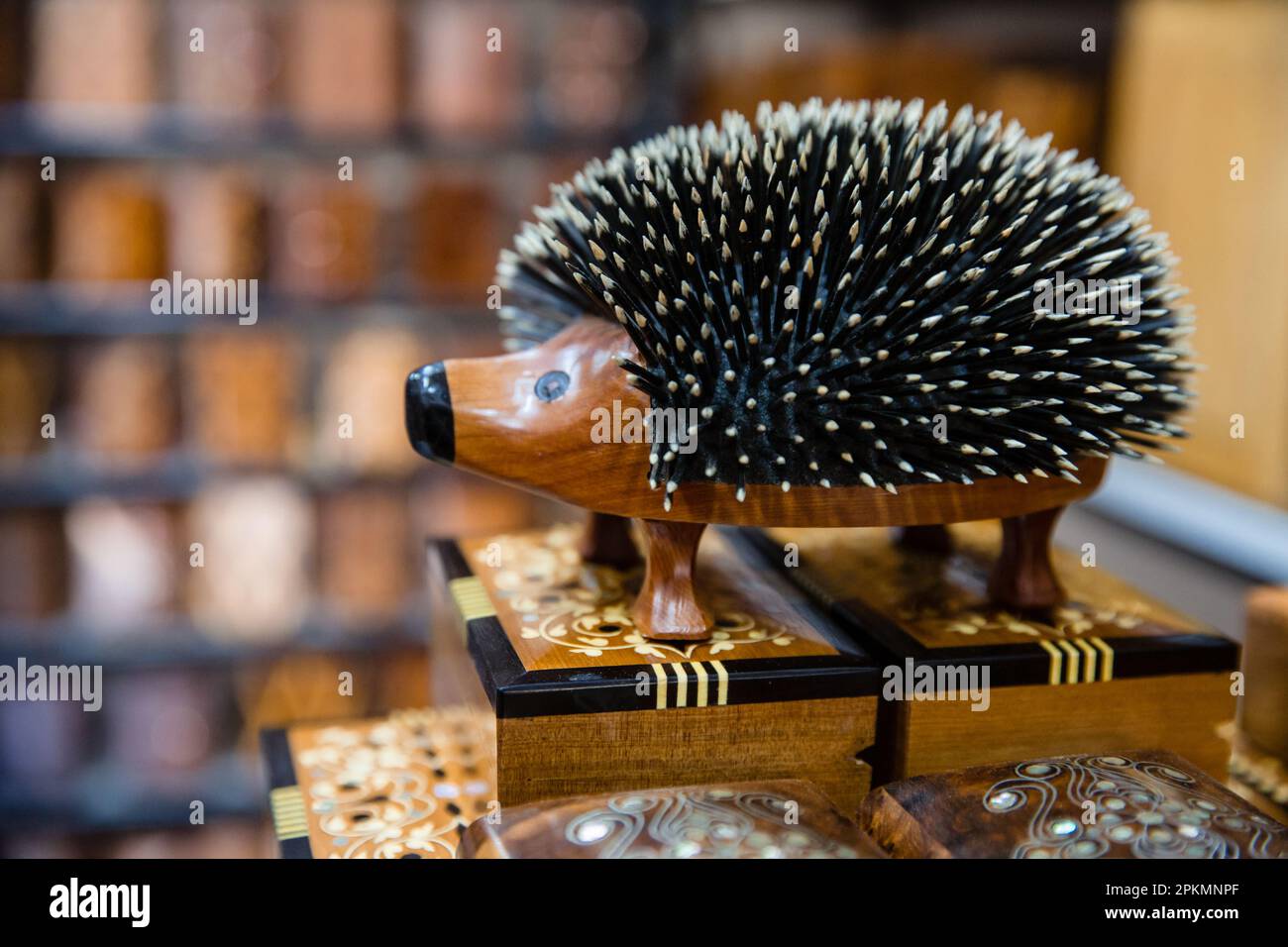 A carved wood porcupine in a shop at L'ensemble Artisanal du Marrakech ...