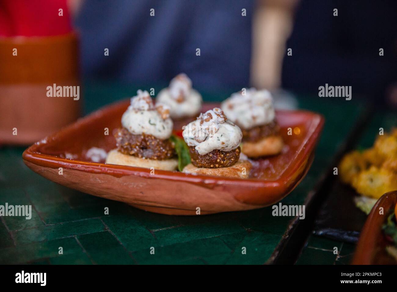 A fig and whipped cheese dish at the rooftop bar of the El Fenn Hotel ...