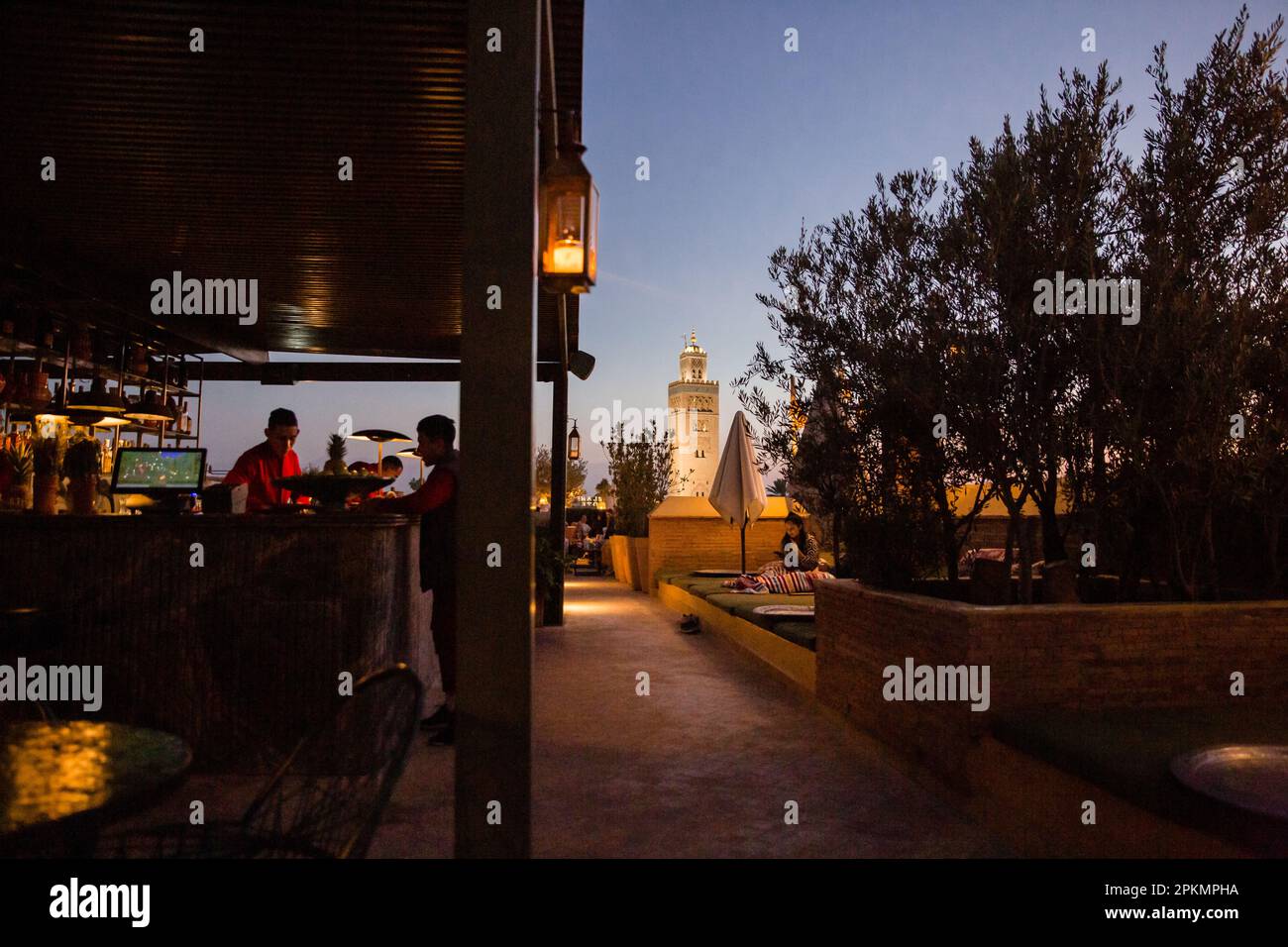 Evening view of the Koutoubia Mosque from the rooftop bar of El Fenn ...