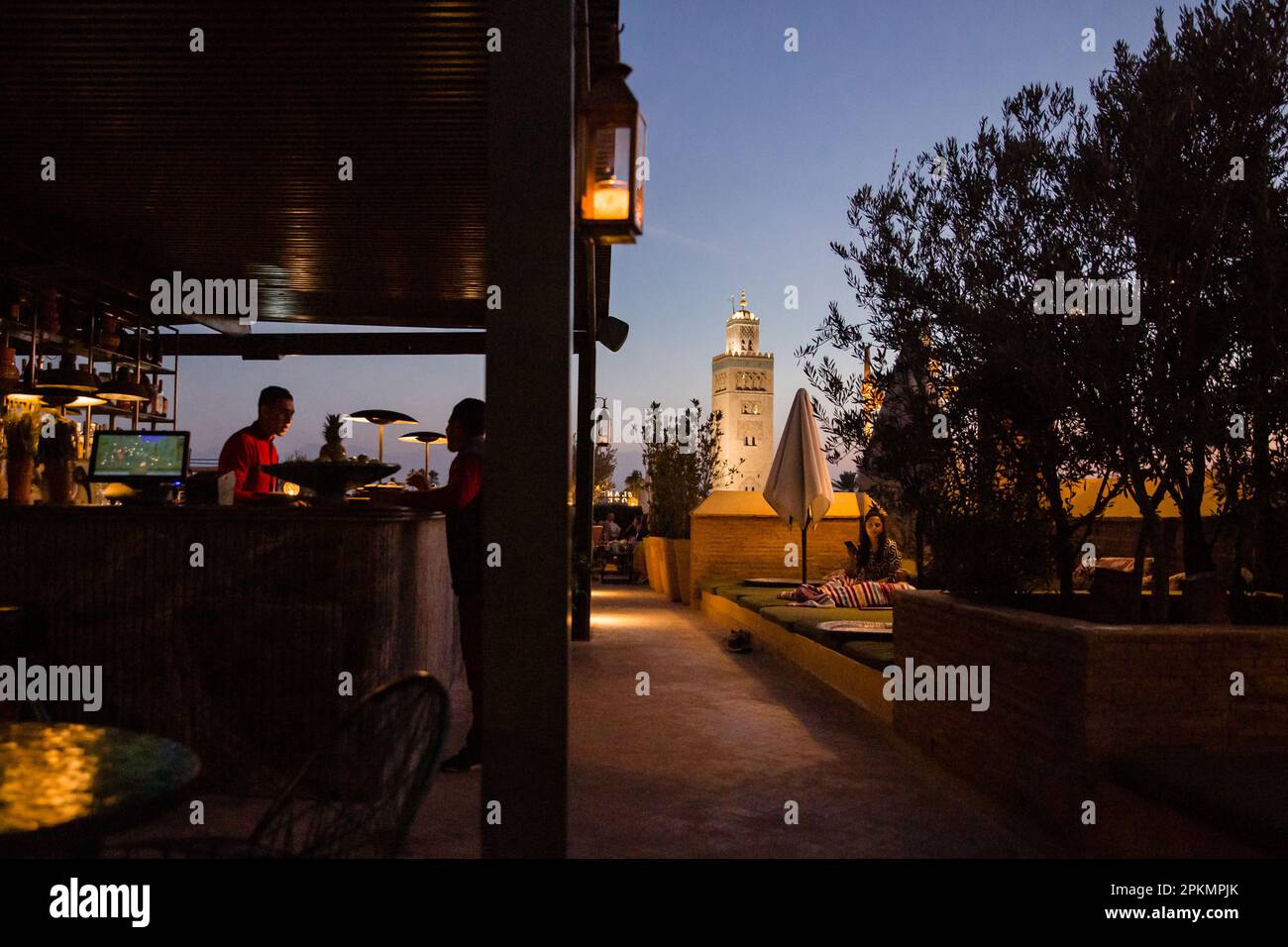 Evening view of the Koutoubia Mosque from the rooftop bar of El Fenn ...
