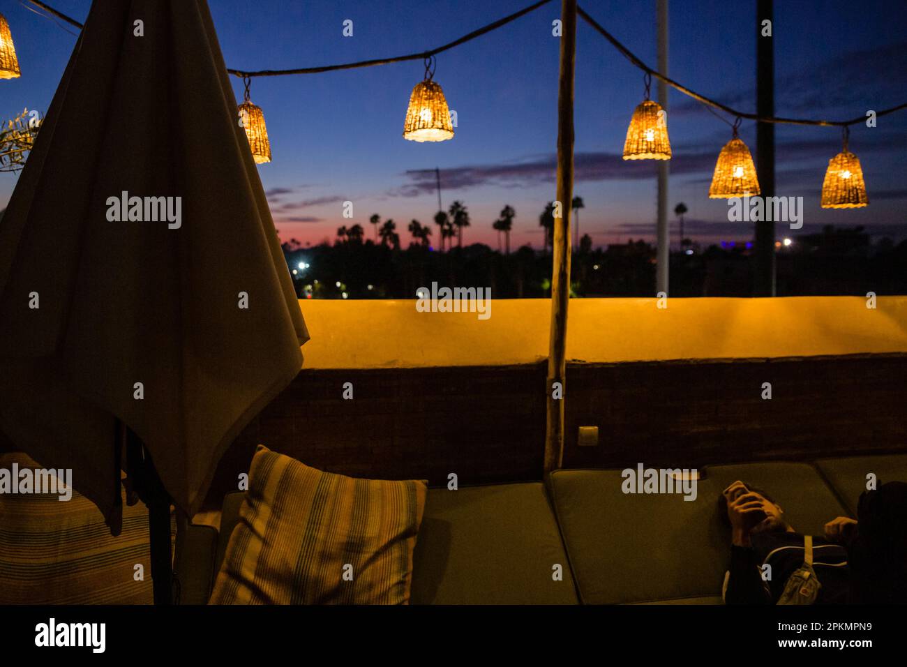 Evening view of the Koutoubia Mosque from the rooftop bar at El Fenn ...