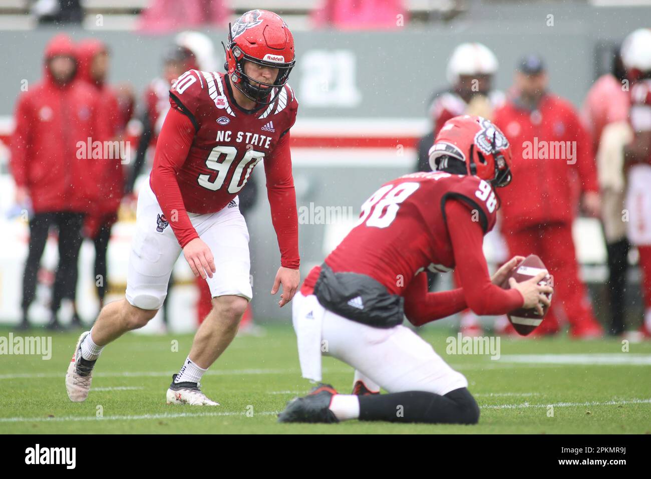 RALEIGH, NC - APRIL 08: NC State kicker Colin Smith (90) kicks the PAT during the NC State ...