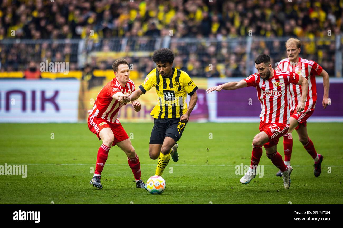 Dortmund, Germany. 8th Apr, 2023. Union's Paul Jaeckel, Karim Adeyemi ...