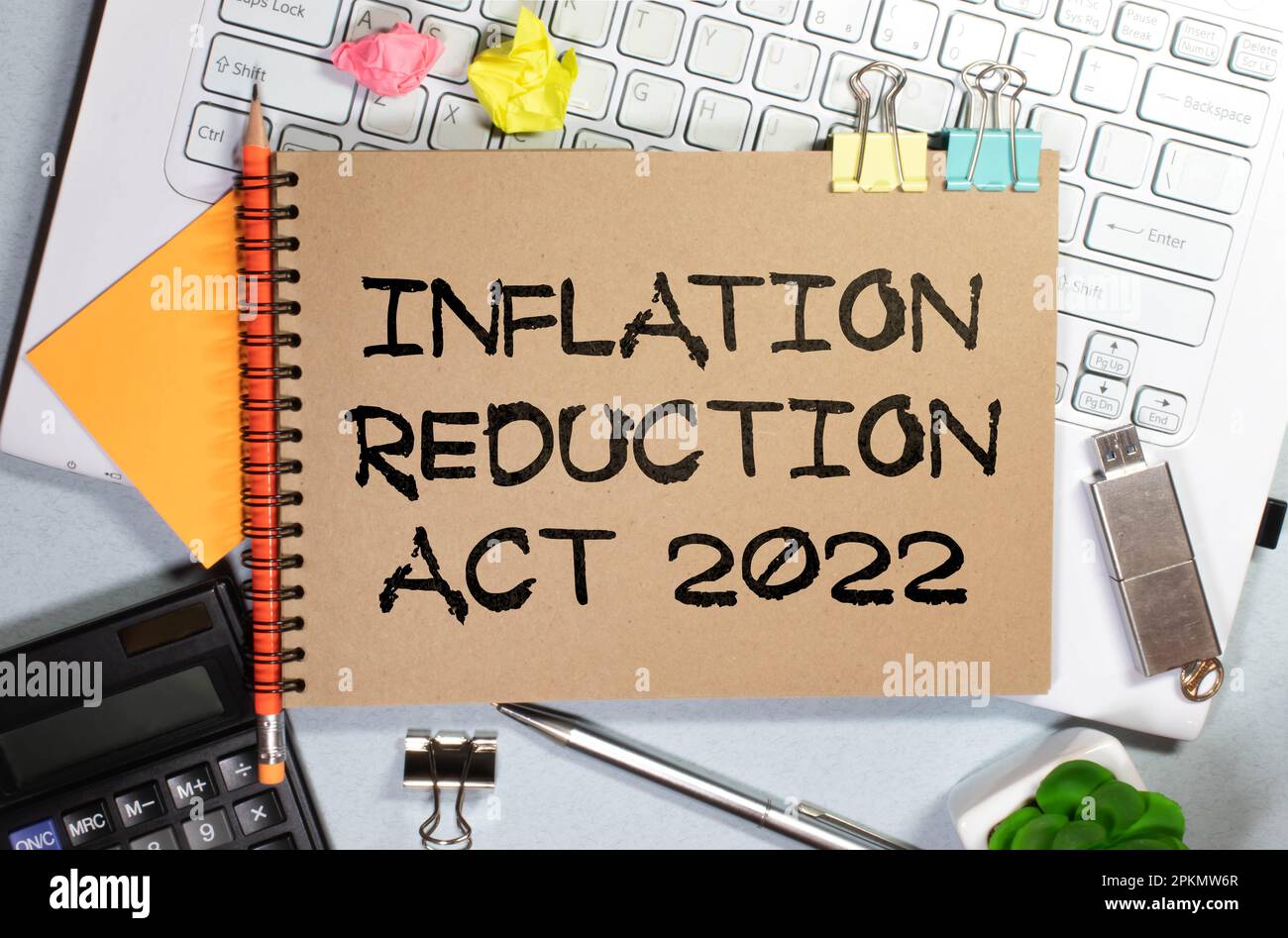 Papers with Inflation Reduction Act of 2022 and notepad Stock Photo - Alamy