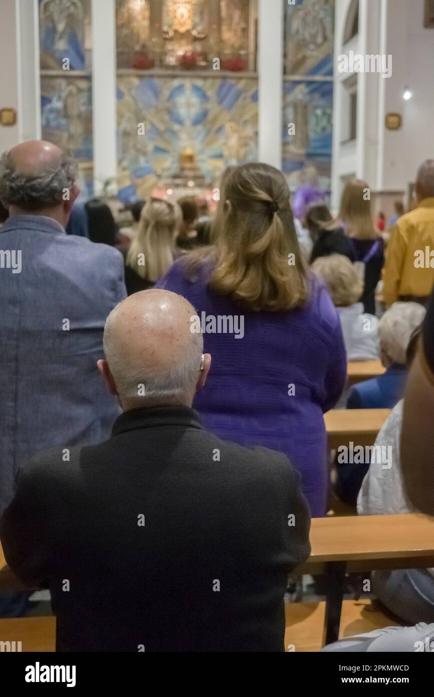Congregation during mass before the procession. The procession of Jesus ...