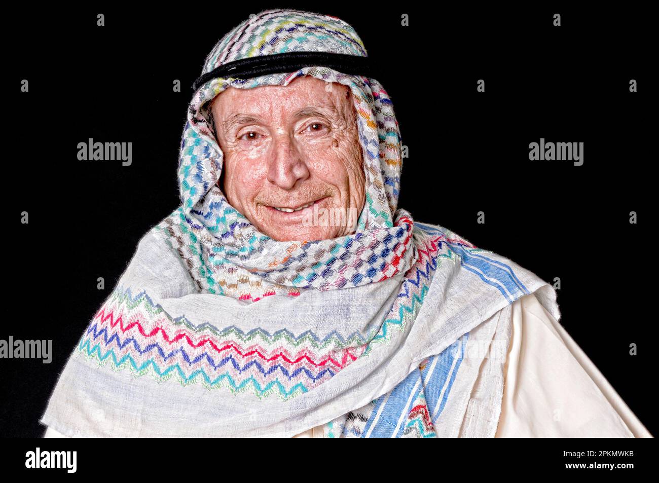 Portrait of an old Arab isolated on black Stock Photo - Alamy