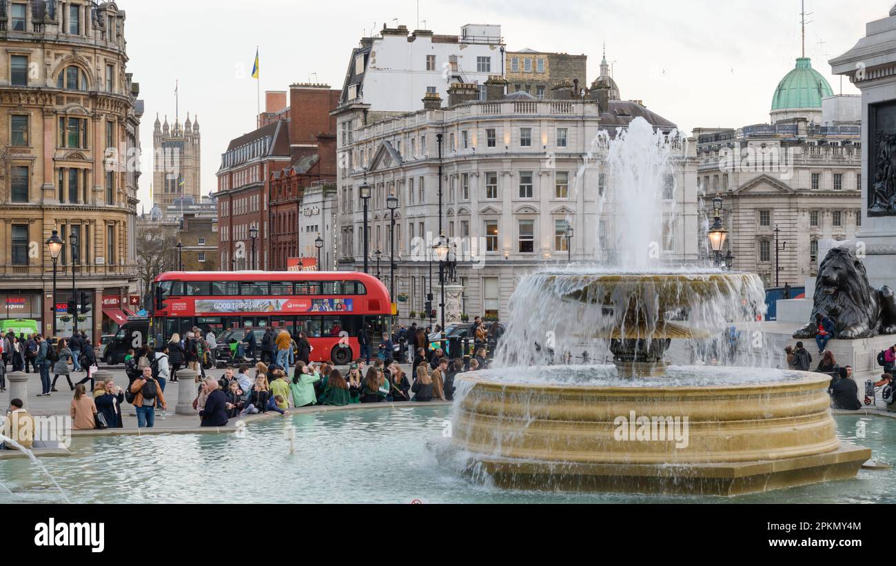 London, UK - March 17 2023; People enjoying Trafalgar Square in London ...
