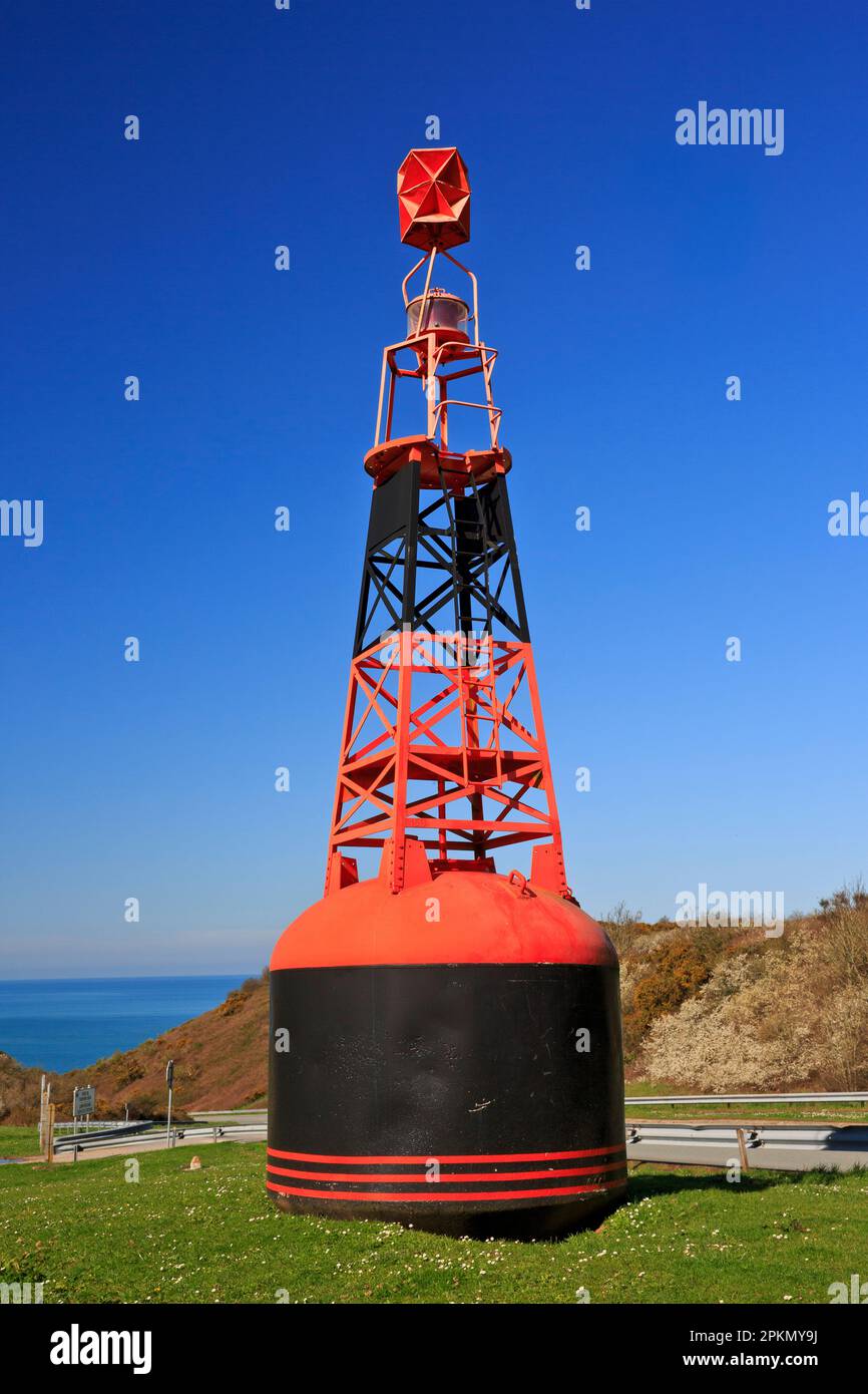 A orange and black buoy at the entrance to the Port of Antifer at Saint ...
