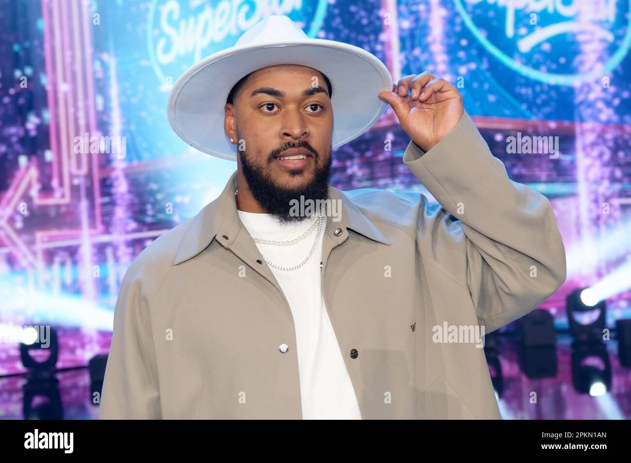 Cologne, Germany. 08th Apr, 2023. The candidate Sem Eisinger stands in ...