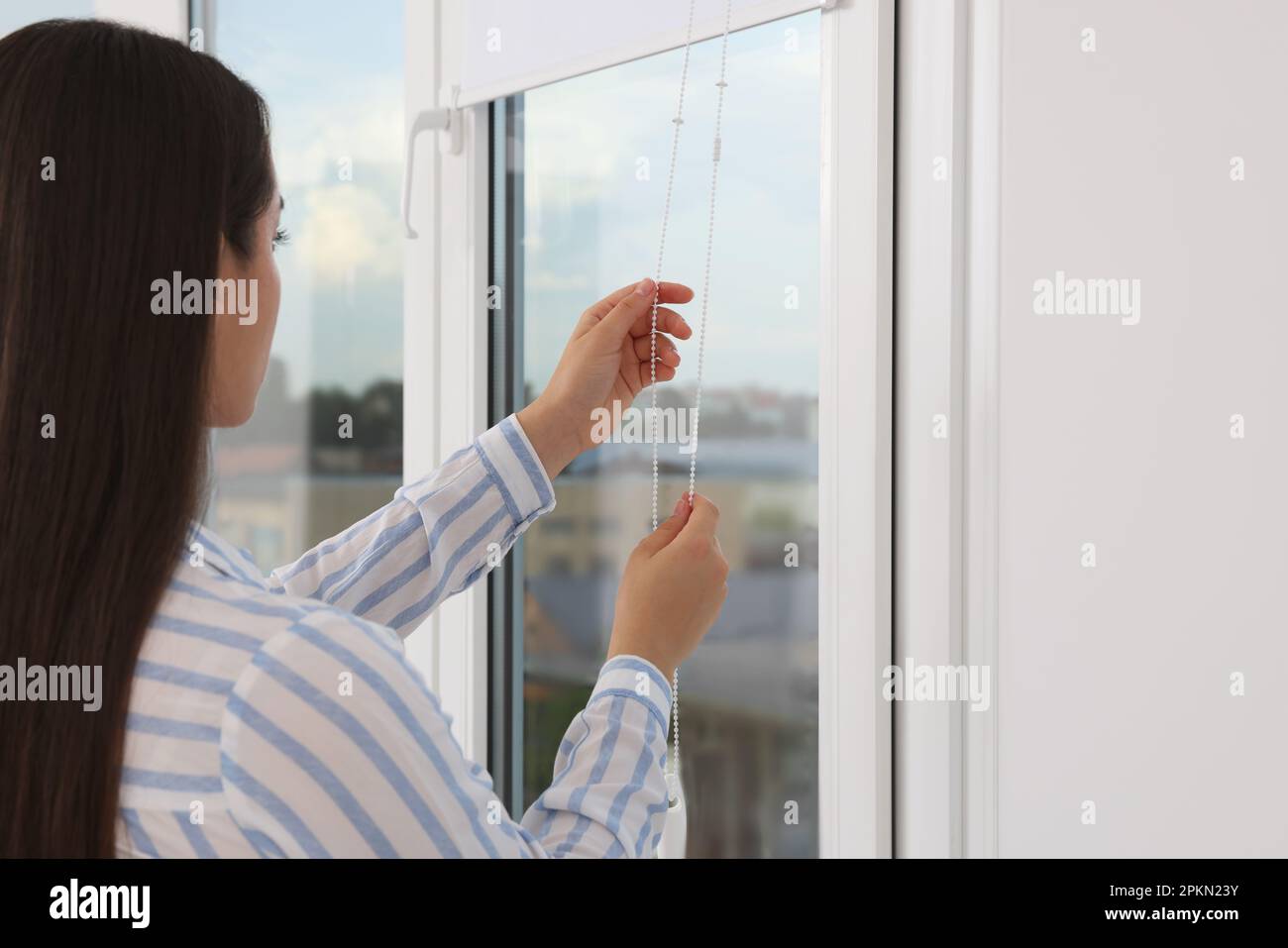 Opening window roller blind hi-res stock photography and images - Alamy