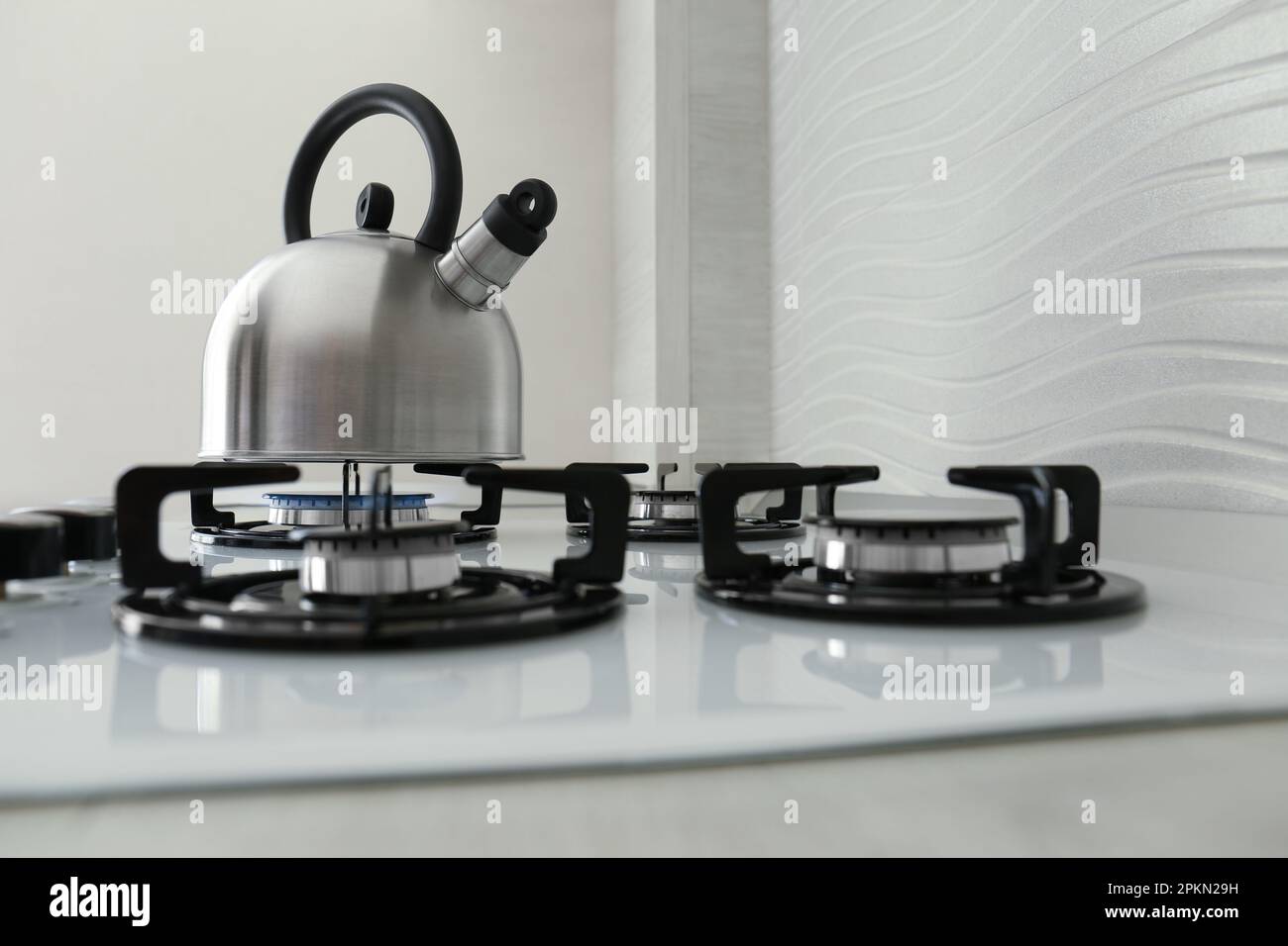 Kettle on gas hob in hi-res stock photography and images - Alamy