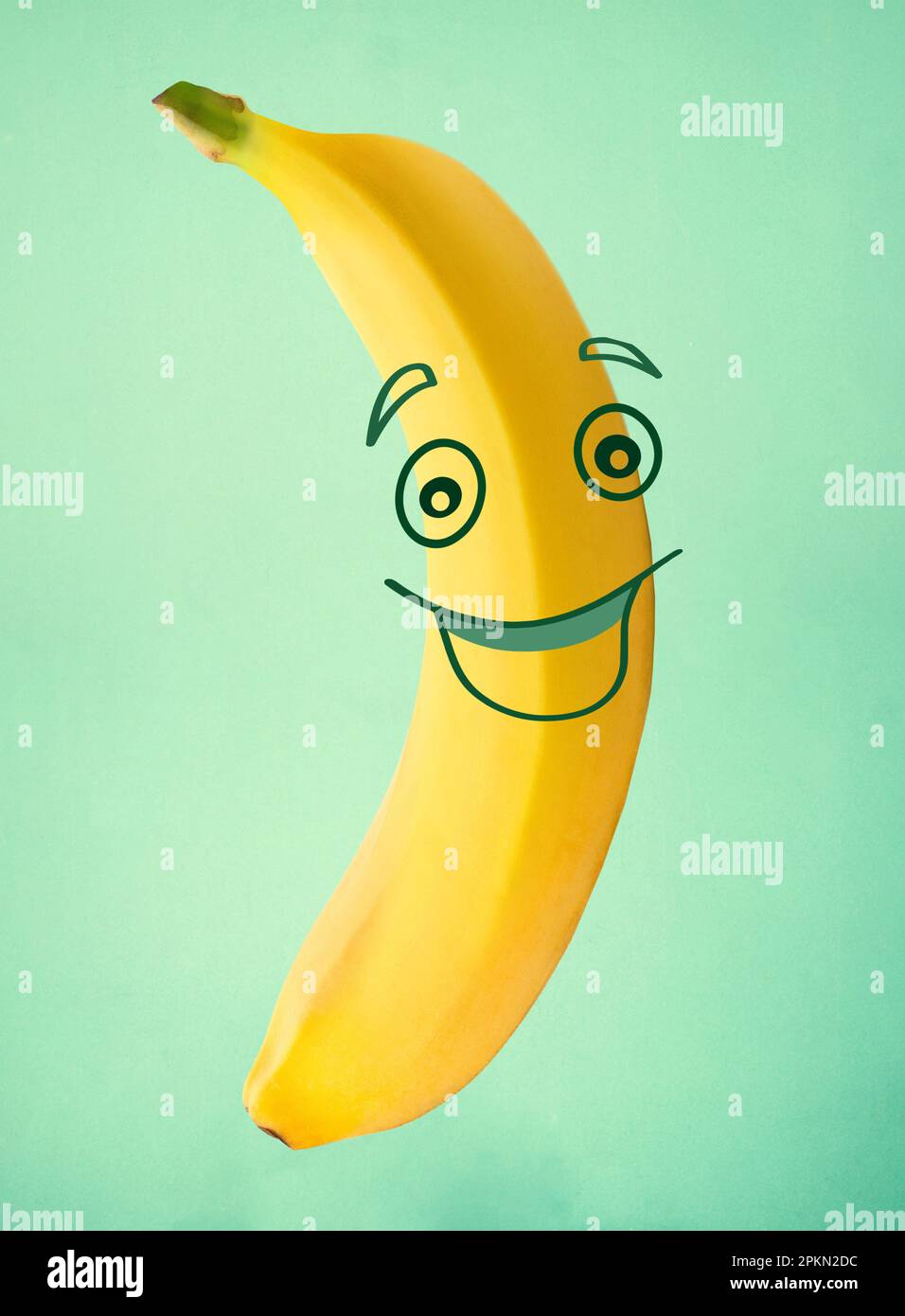 Funny cute yellow banana in cartoon face style Stock Photo - Alamy