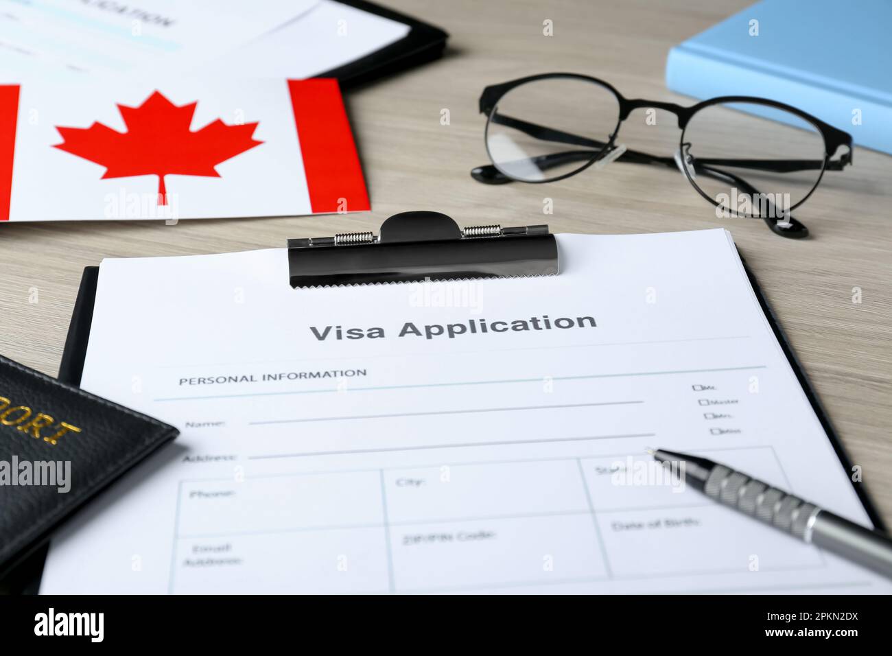 Visa application form for immigration, passport, Canadian flag and ...