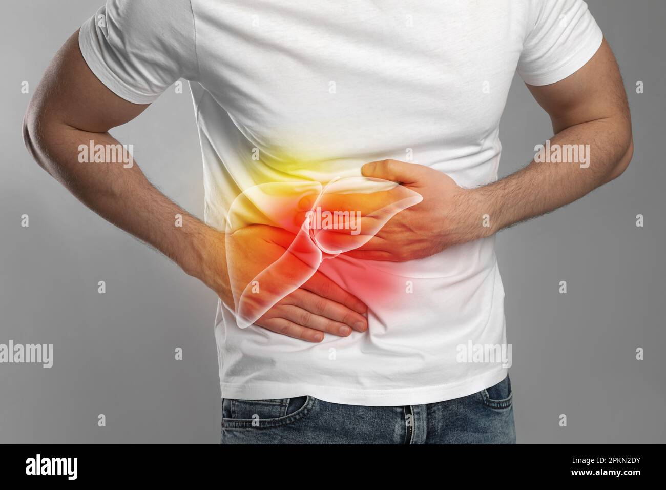 Man suffering from liver pain on grey background, closeup Stock Photo ...