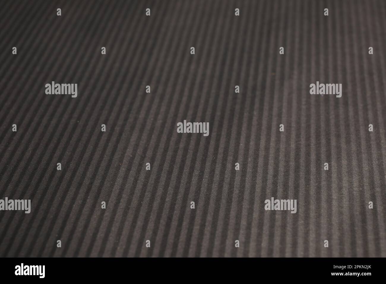 Dark grey corrugated sheet of cardboard as background, closeup Stock ...