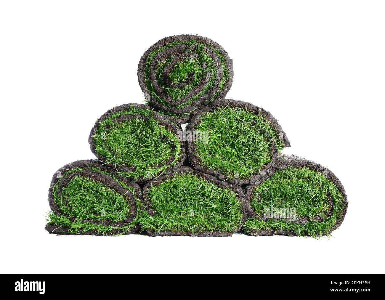 Rolls of grass sod on white background Stock Photo - Alamy