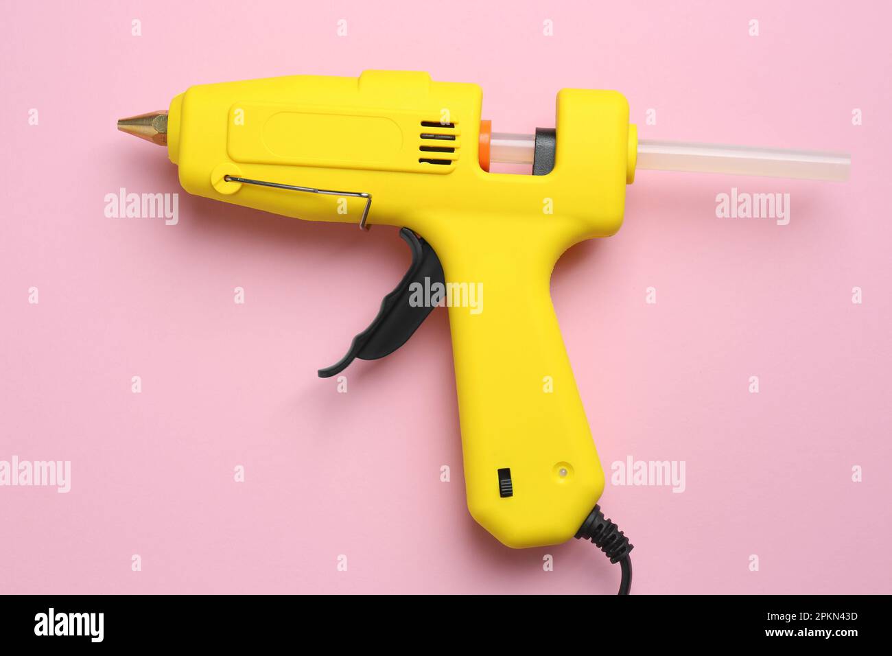 Yellow silicone glue gun hi-res stock photography and images - Alamy