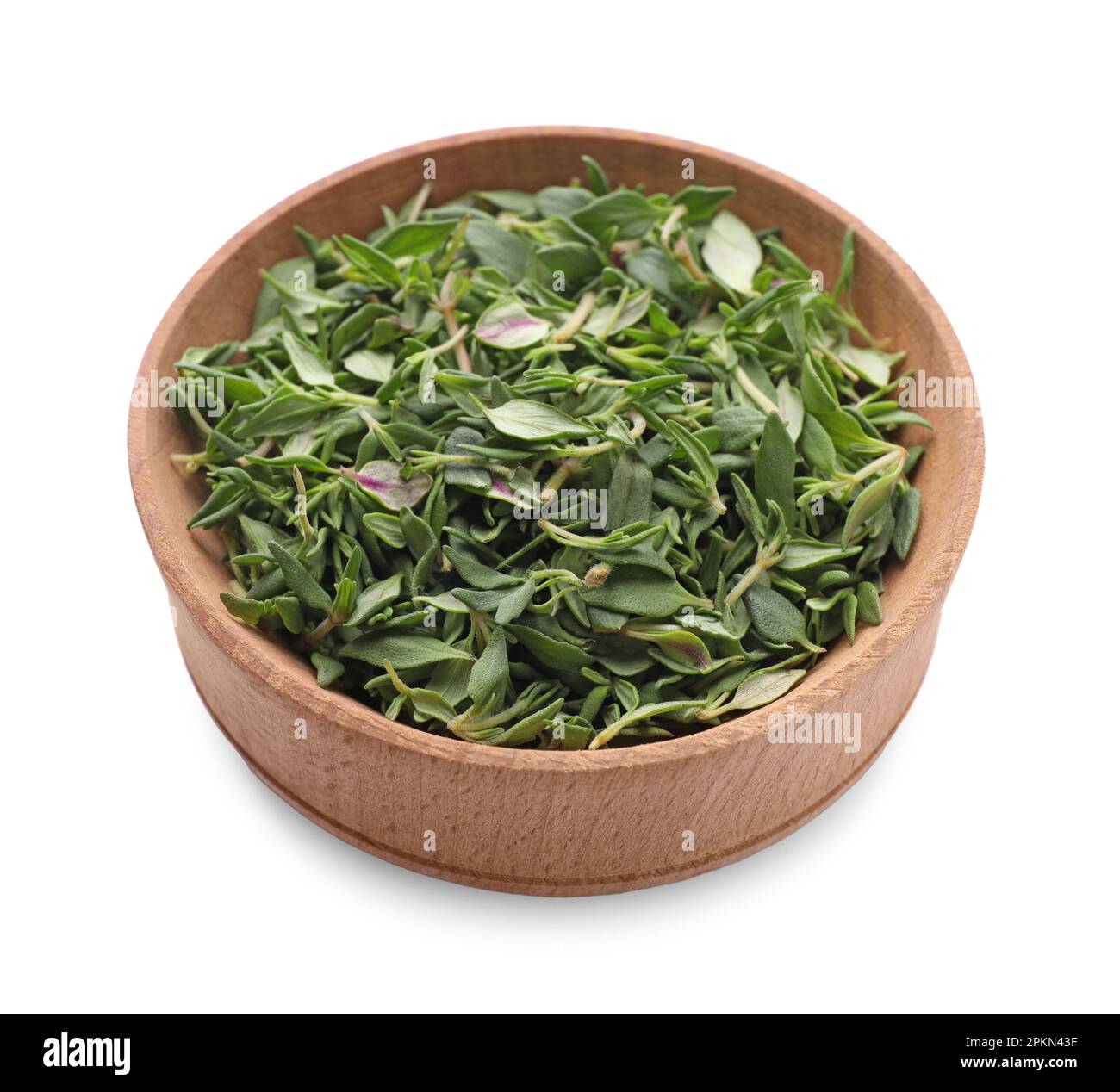 Wooden bowl of fresh green thyme leaves on white background Stock Photo - Alamy
