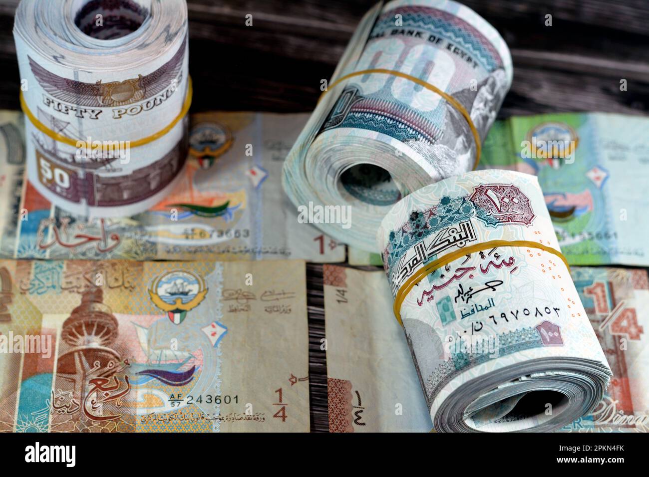 Rolls of Egypt money banknote bills of 100 and 50 EGP LE one hundred ...