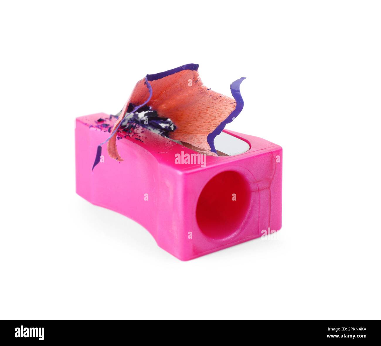 Pink sharpener with pencil shavings on white background Stock Photo - Alamy