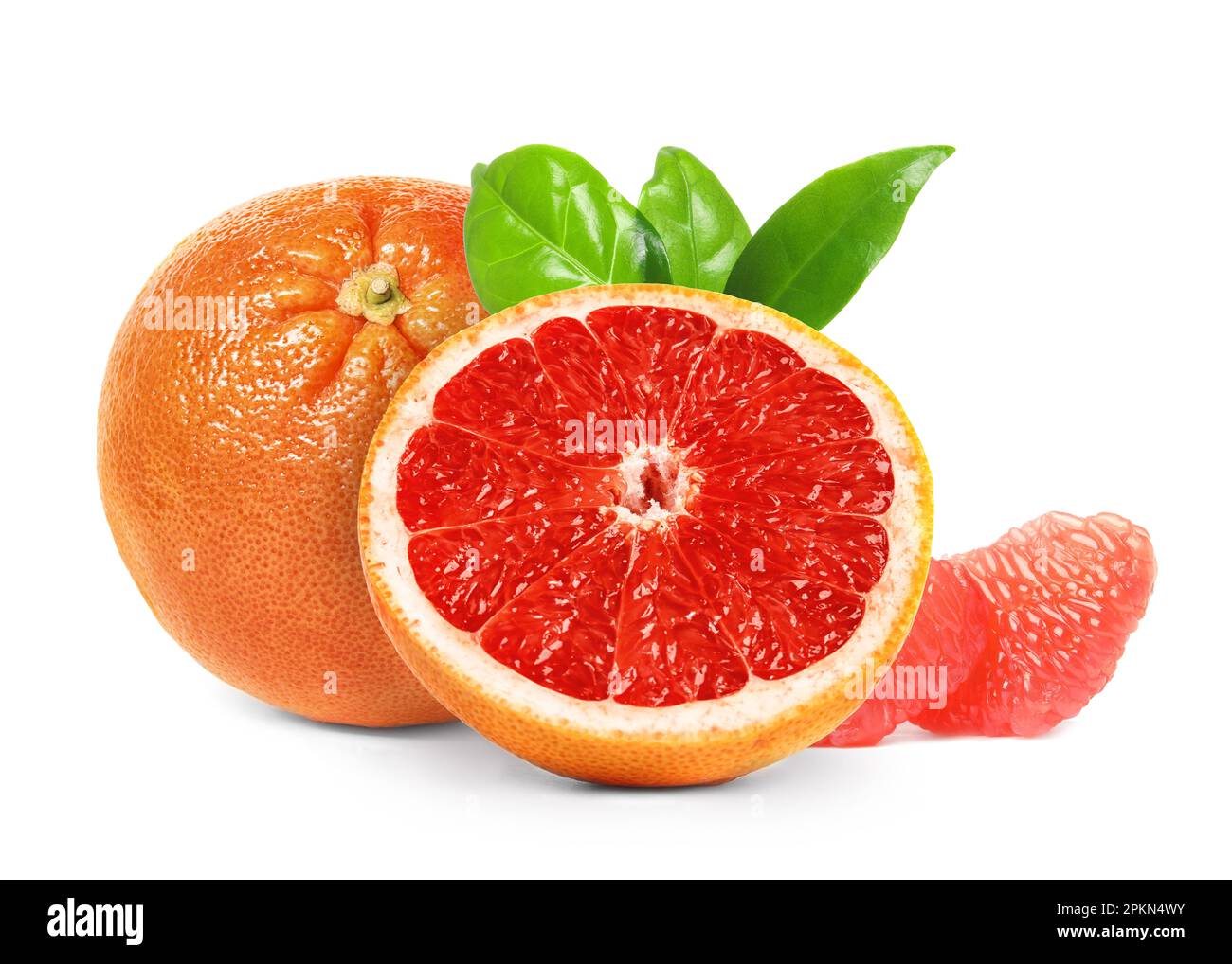 Tasty ripe grapefruits and green leaves on white background Stock Photo ...