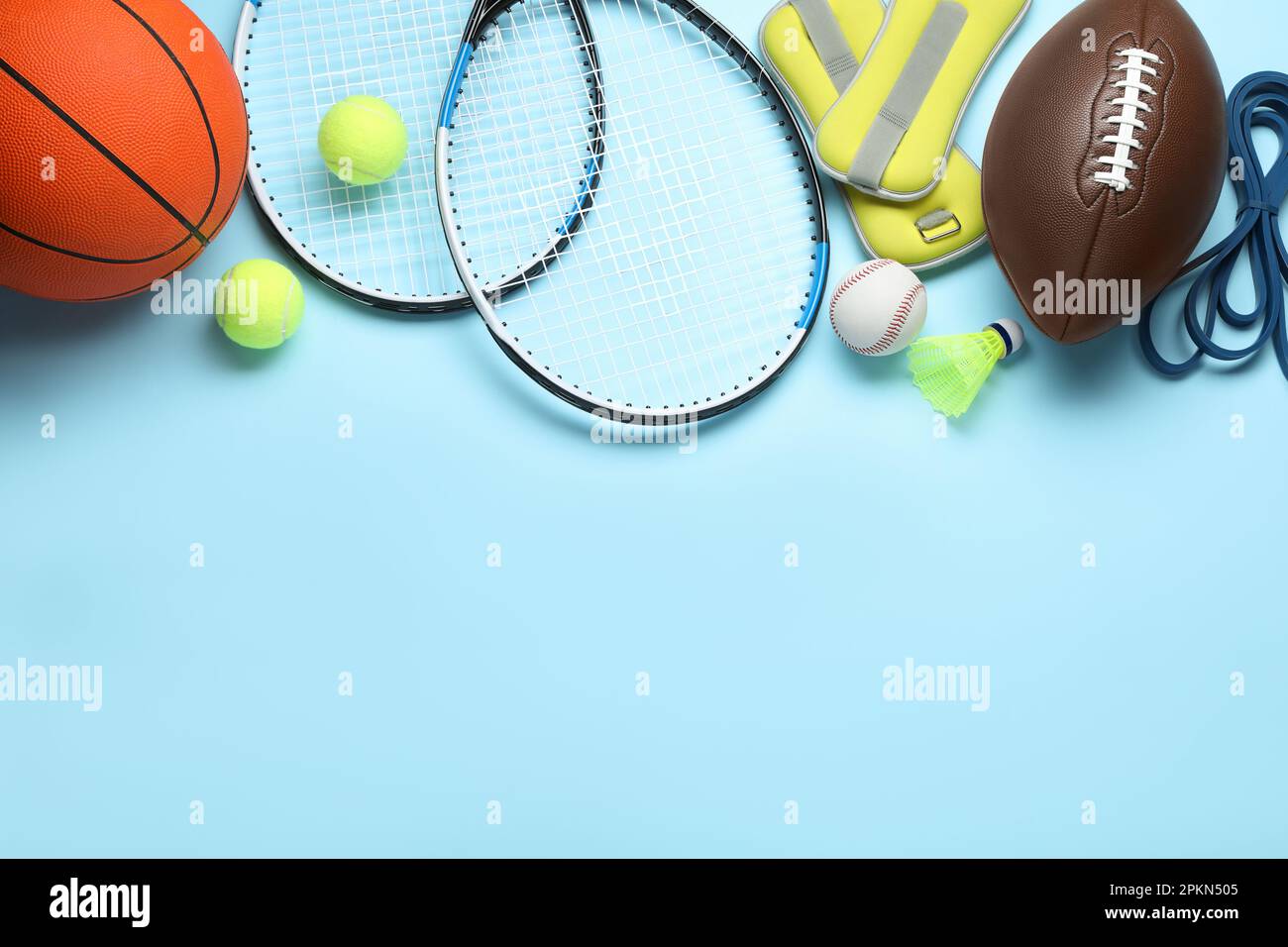 Set of different sports equipment on light blue background, flat lay ...