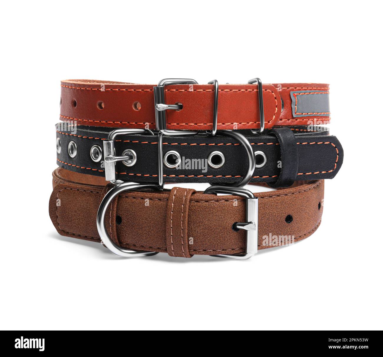Different leather dog collars on white background Stock Photo - Alamy