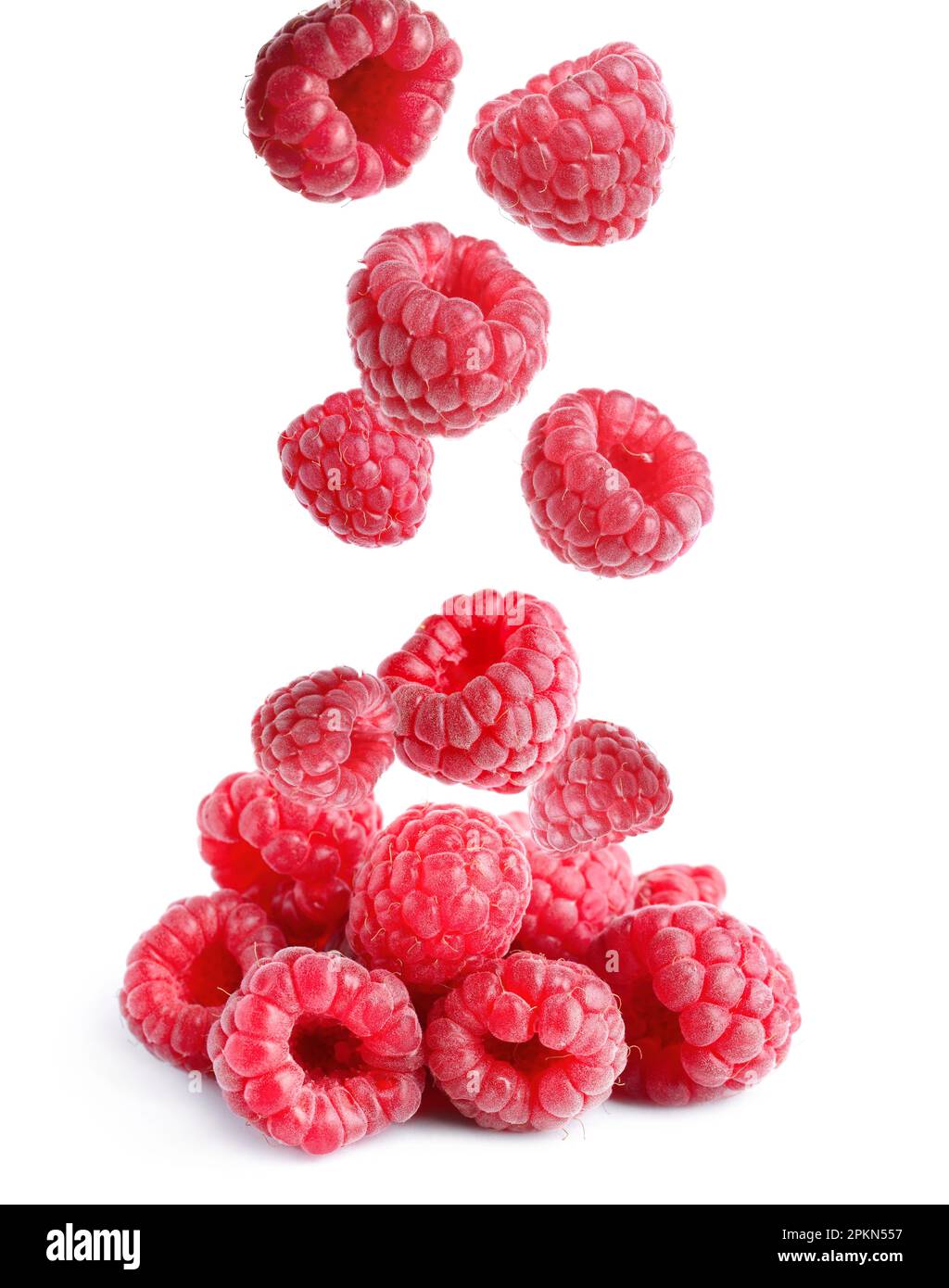 Delicious ripe raspberries falling on white background Stock Photo - Alamy