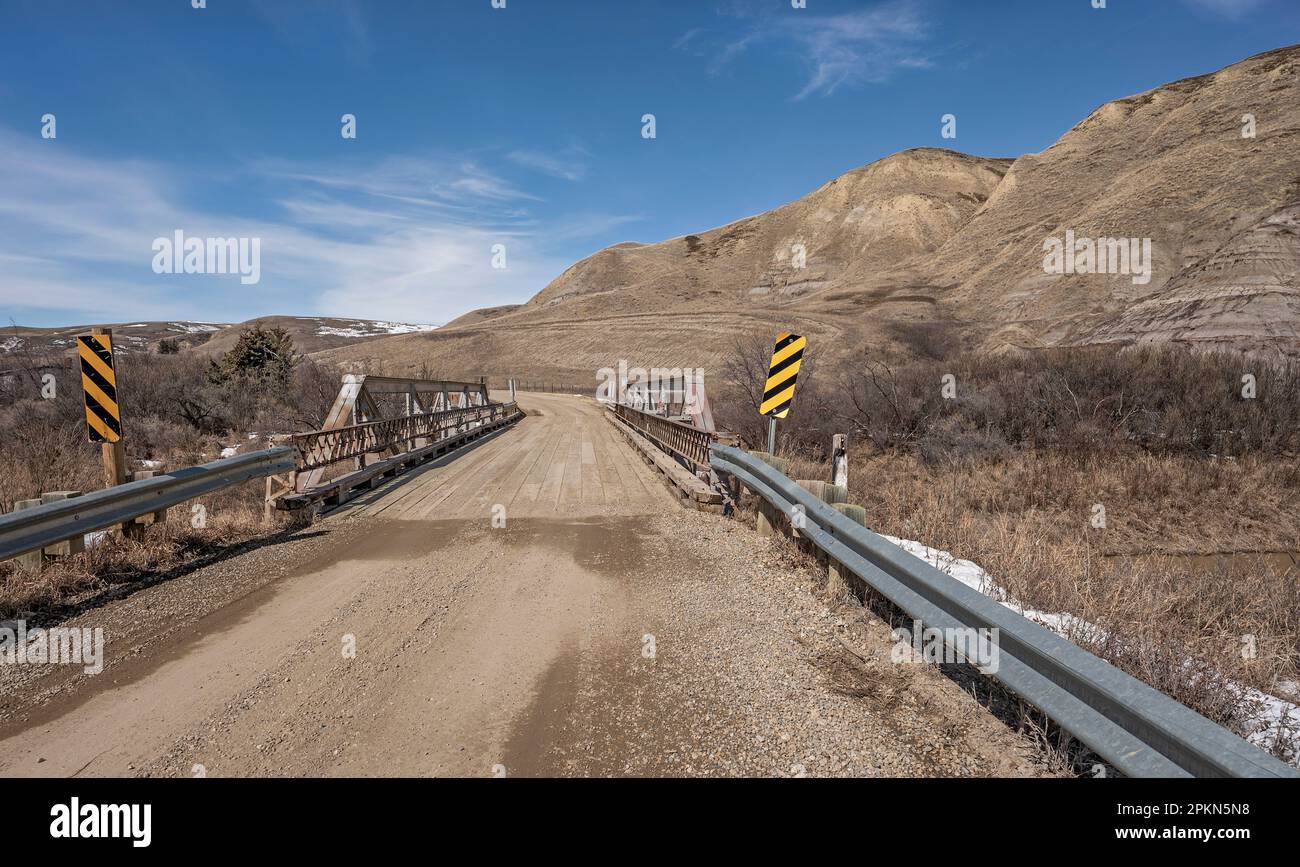 Gravel road crossing the Rosebud River at the ghost town of Beynon ...