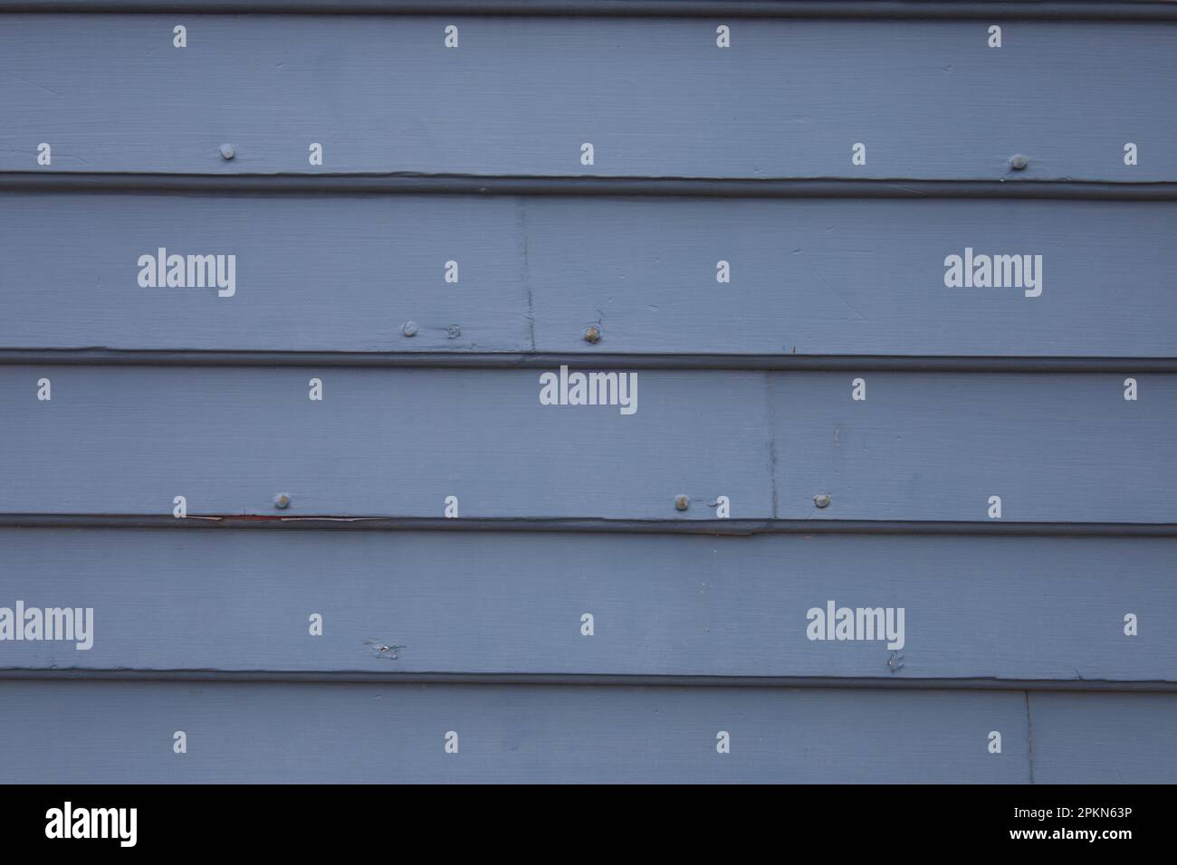 Blue wooden siding of vintage home from 1700s in Newport, Rhode Island ...