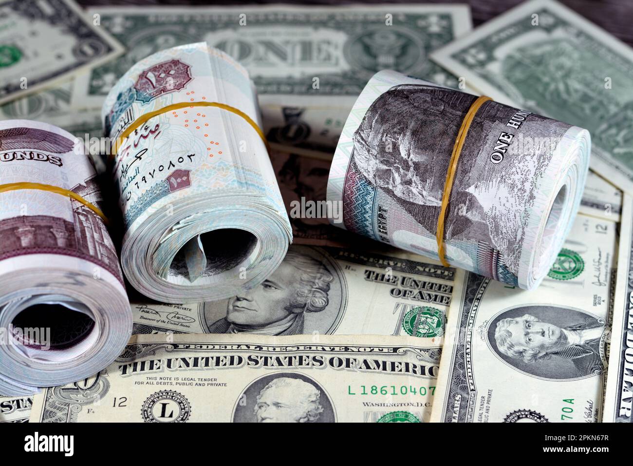 Rolls of Egypt money banknote bills of 100 and 50 EGP LE one hundred ...