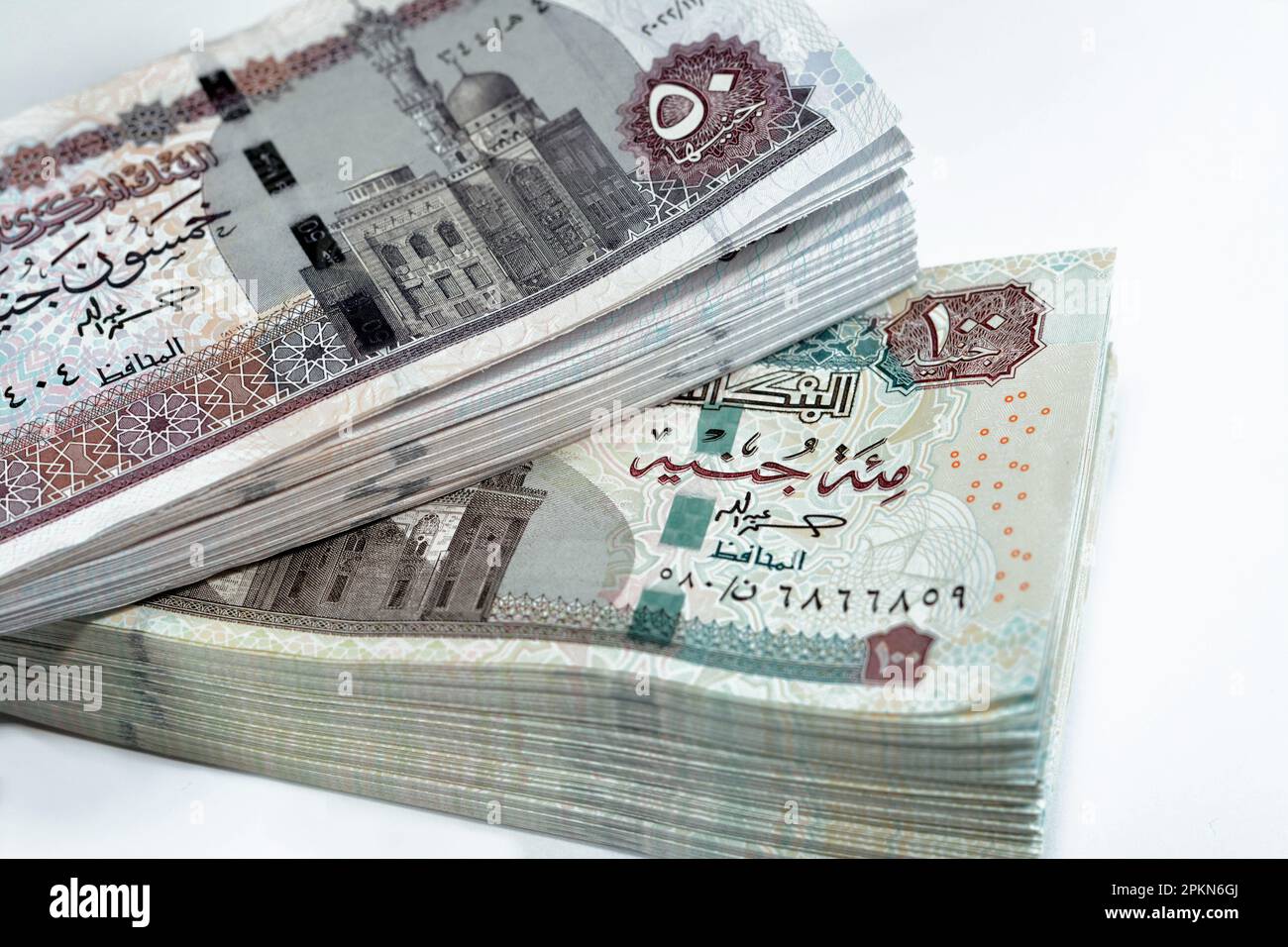 Stacks of Egypt money banknote bills of 100 and 50 EGP LE one hundred ...