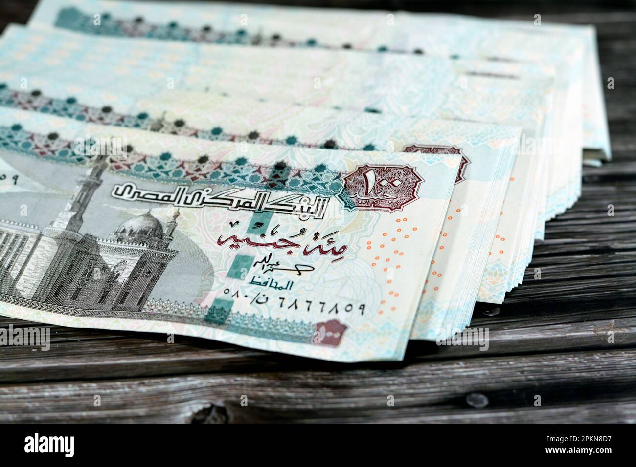 Stack of Egyptian currency of 100 EGP LE one hundred Egyptian pound ...