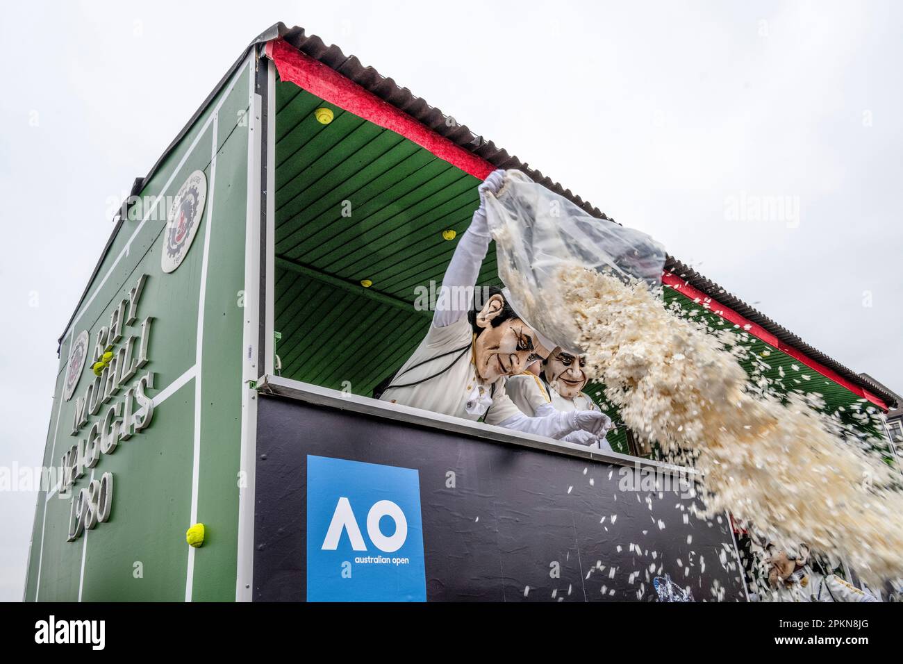 Roger Federer theme float throwing confetti on parade goers at the the ...