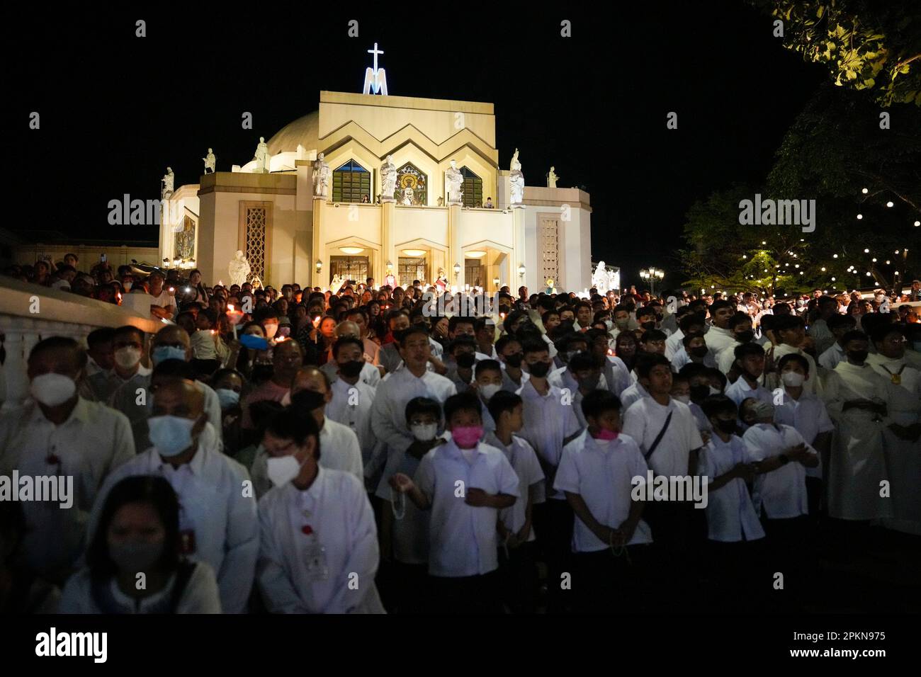 Devotees attend a Mass as part of Easter Sunday rites at the Antipolo ...