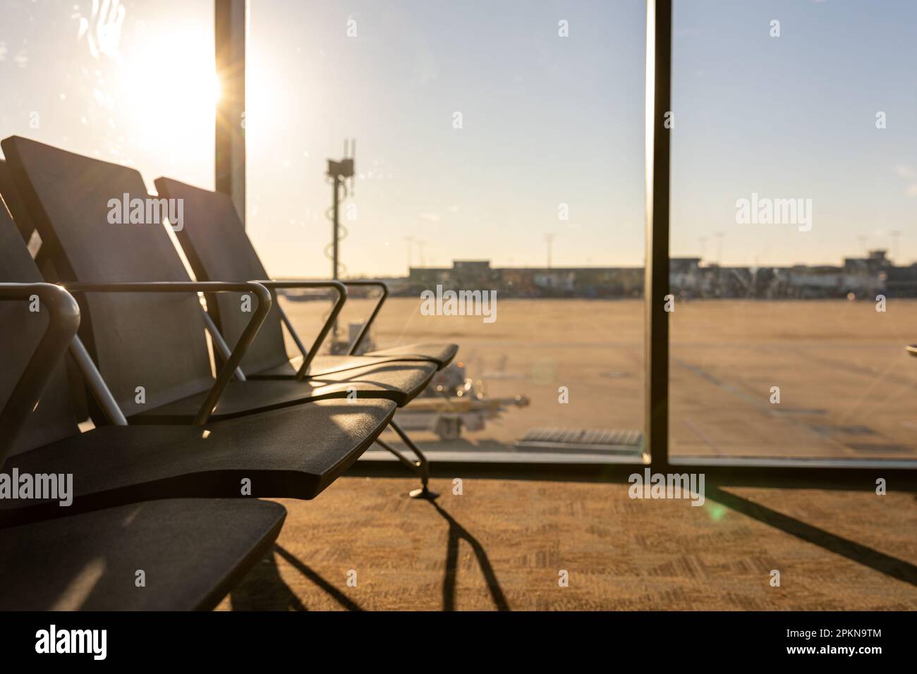 Airport gate waiting area with seating for passengers Stock Photo - Alamy