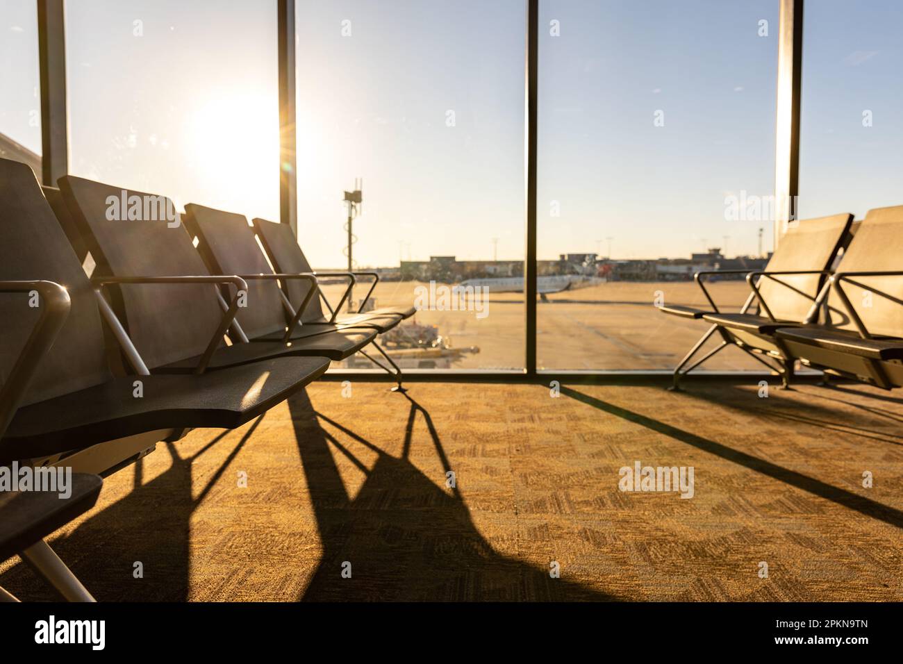 Airport gate waiting area with seating for passengers Stock Photo - Alamy