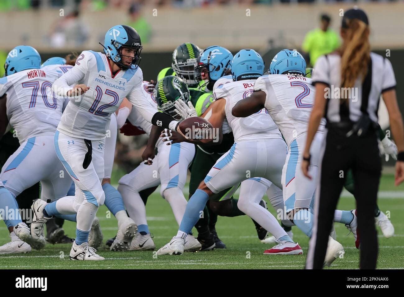 April 8, 2023: Arlington Renegades quarterback LUIS PEREZ (12) hands ...