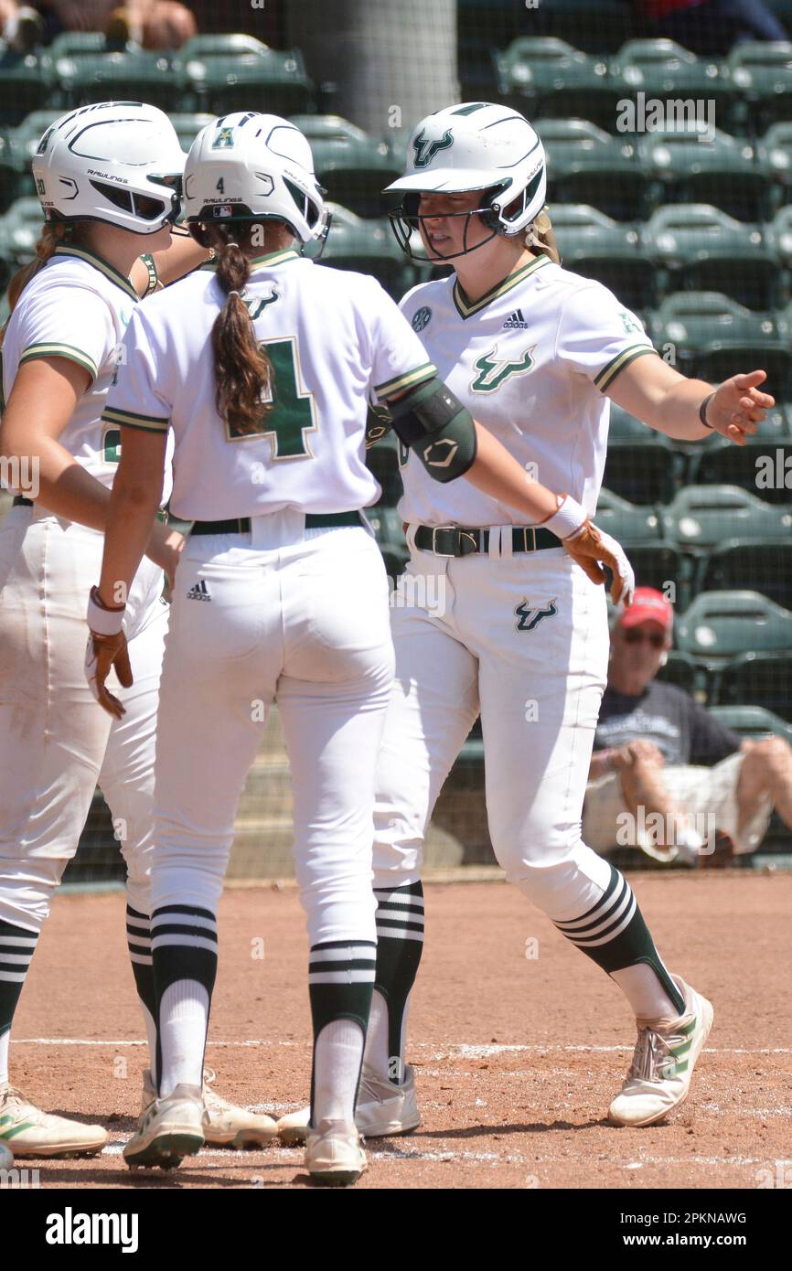 South Florida Marissa Trivelpiece (46) is greeted by teammates after ...