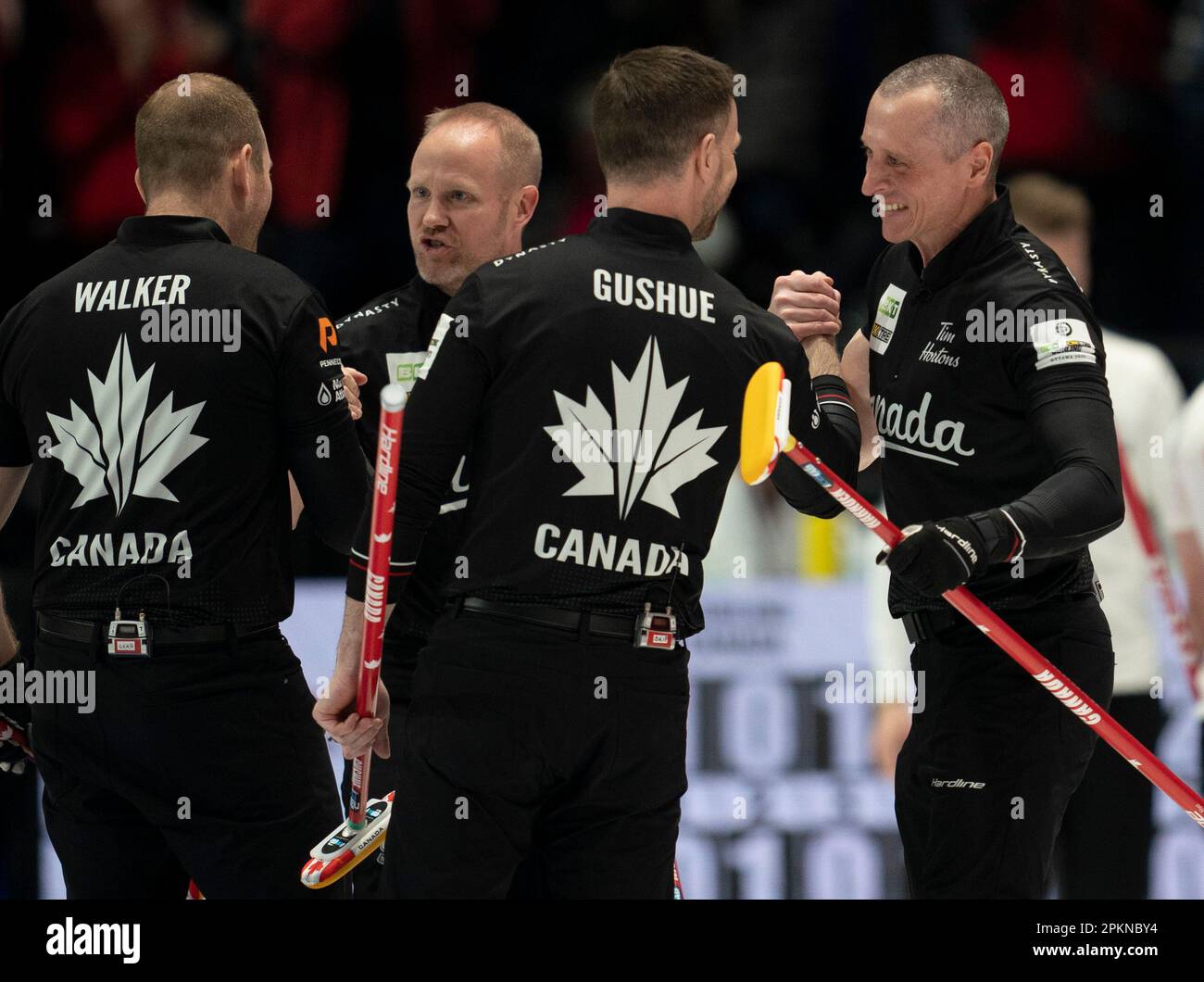 Canada lead Geoff Walker, vice skip Mark Nichols, skip Brad Gushue and ...