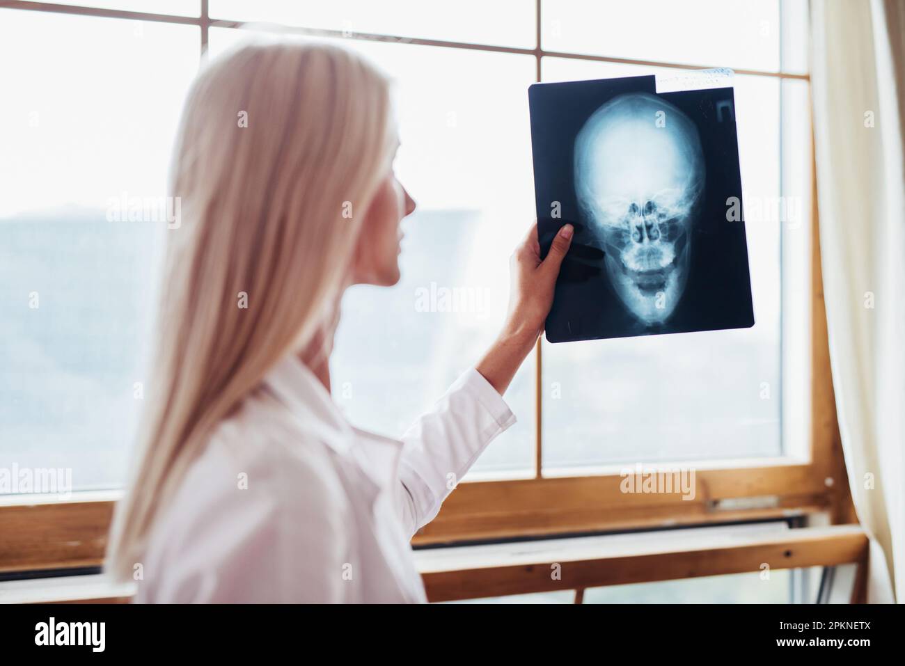 Woman Doctor Looking at X-Ray Radiography in hospital Stock Photo - Alamy
