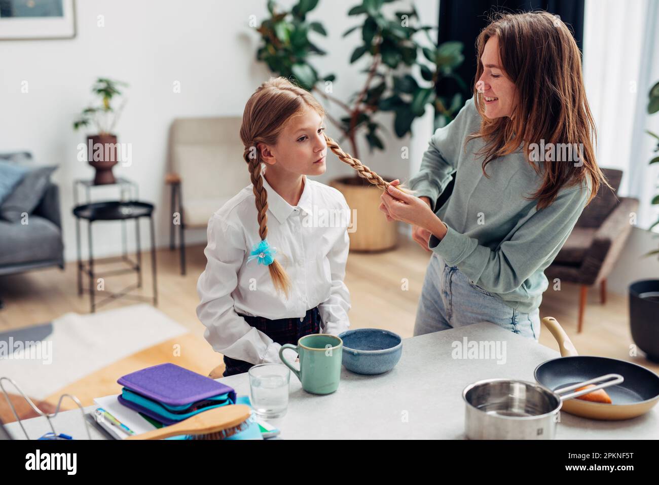 Twin braids hi-res stock photography and images - Alamy