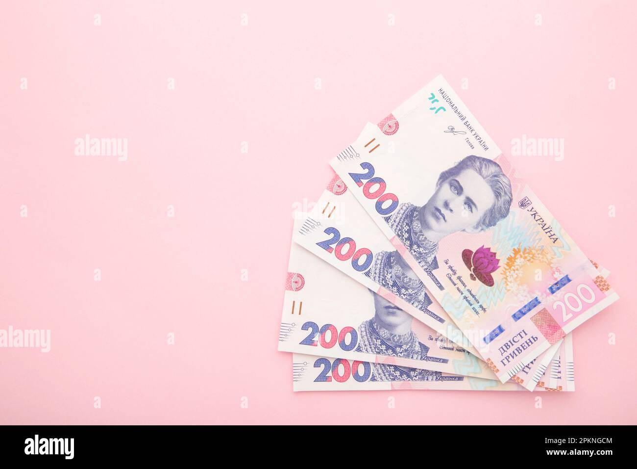 Banknotes Ukraine 200 hryvnia on pink background. Ukrainian Money with ...